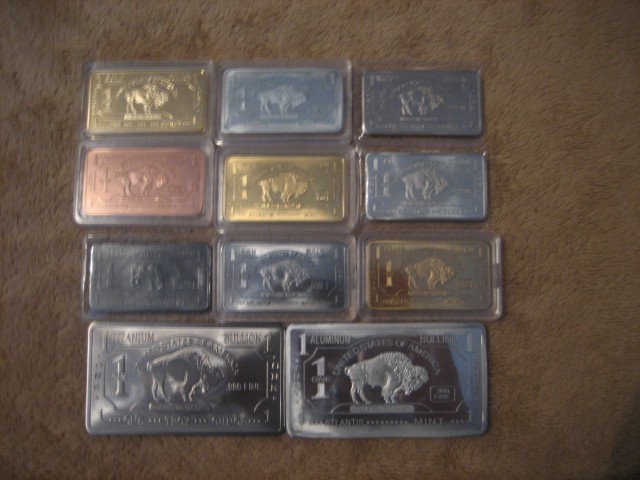 Colectie 11 lingou lingouri 1 uncie aur (placat), cupru, zinc, fier ...