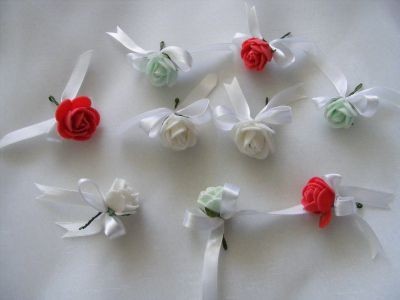 COCARDE artificiale de pus in piept pentru invitati! | arhiva Okazii.ro