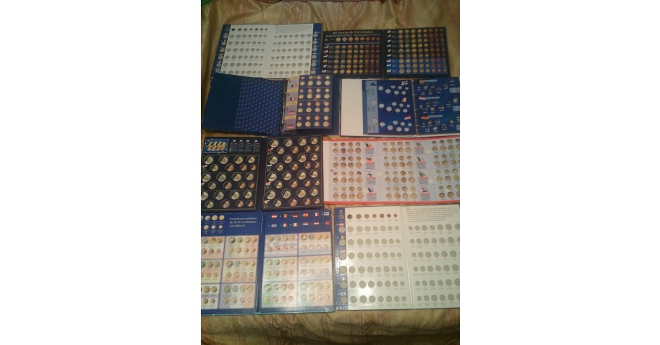 Lot 8 albume pentru monede euro (intră peste 1000 de monede euro și ...